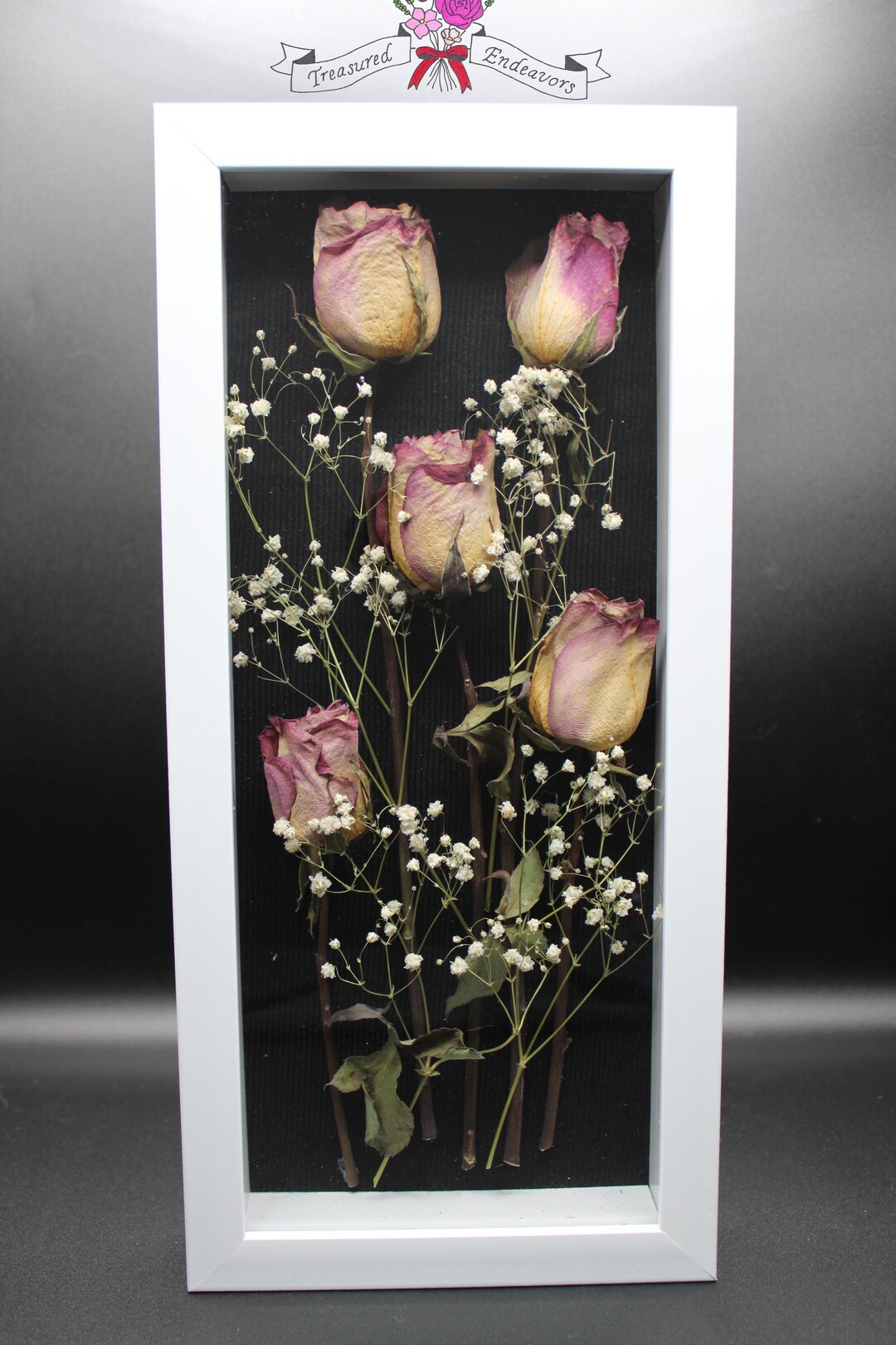 Botanical Beauty: Pink Roses Encased and Preserved in a Timeless ...