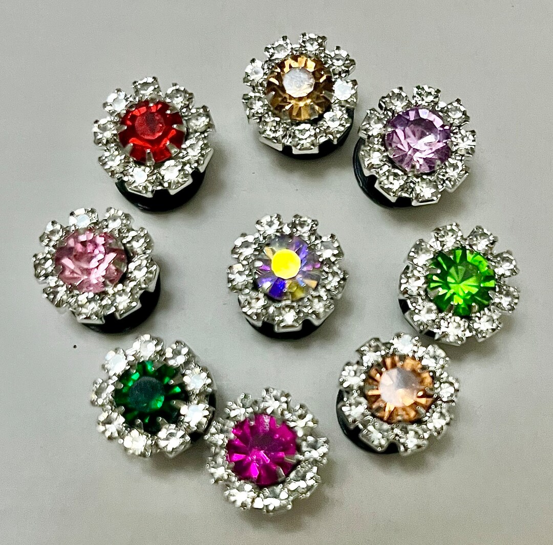 Large Colorful Rhinestones Surrounded by Clear Smaller Ones, Encased in ...