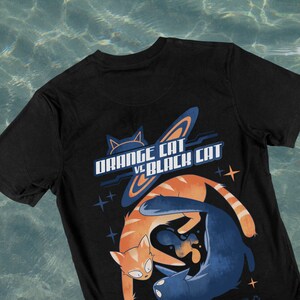 Y2K Streetwear, Linda ilustración de gato naranja VS negro, camiseta ...