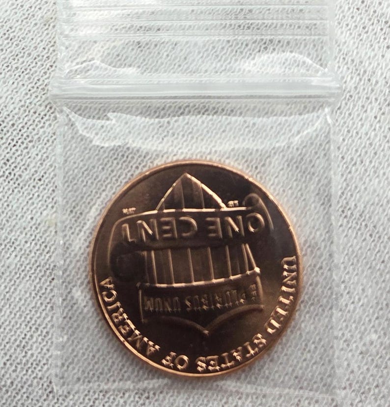 2025 Lincoln Penny Cent OMEGA Ω Counterstamp IN STOCK! - Etsy