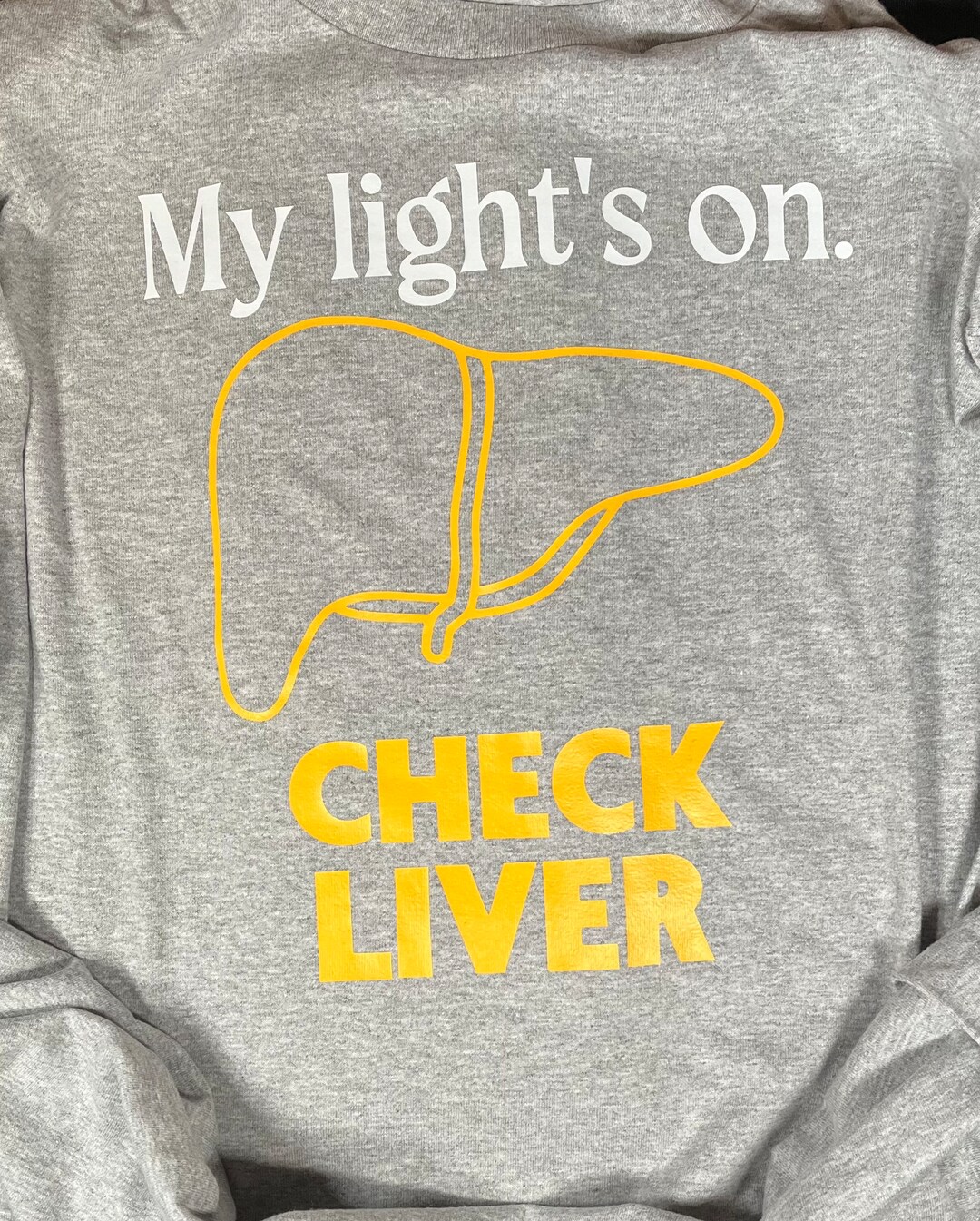Check Liver Light Tee - Etsy