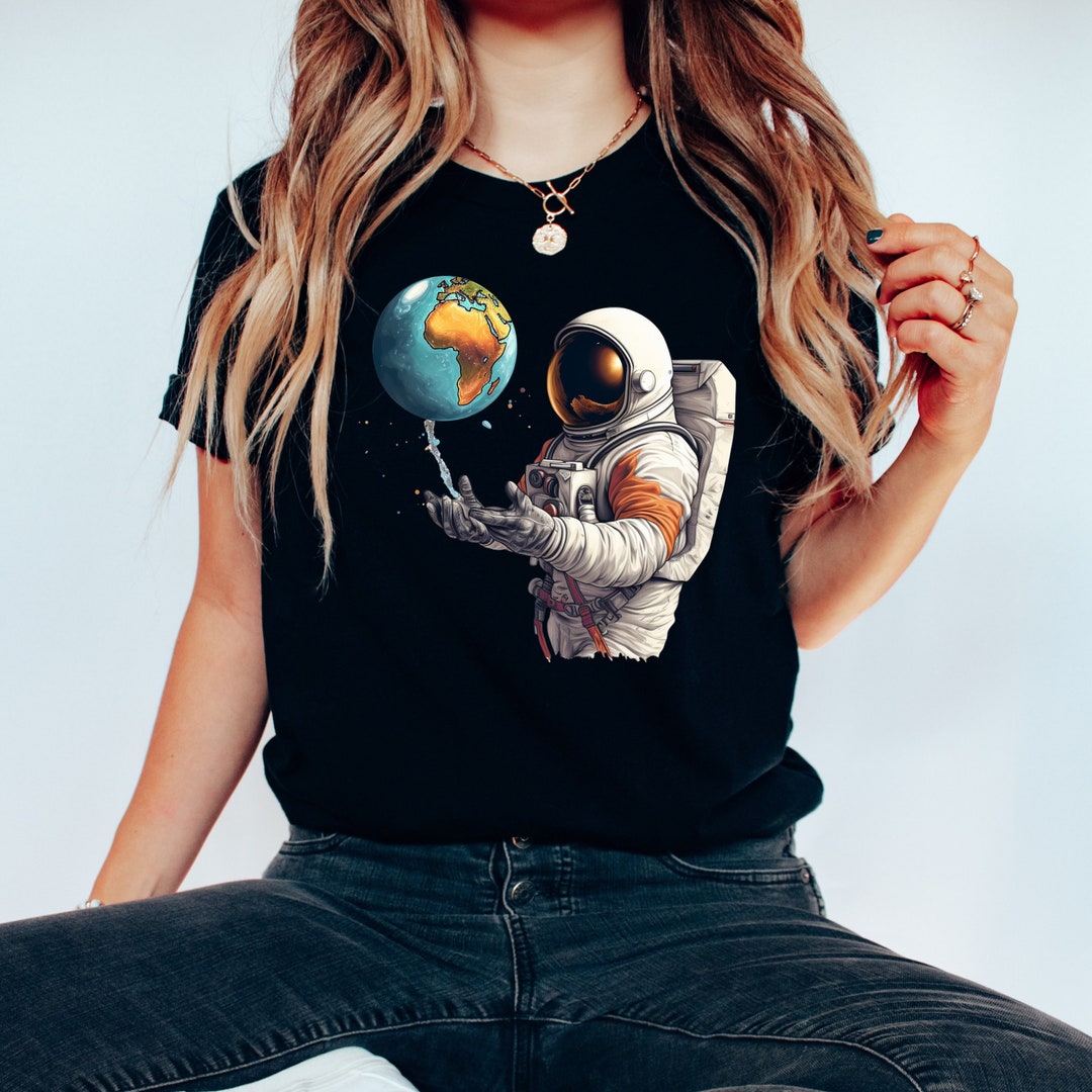Astronaut Balancing Earth Tshirt. Astronaut. Astronomer. Planets. Outer ...