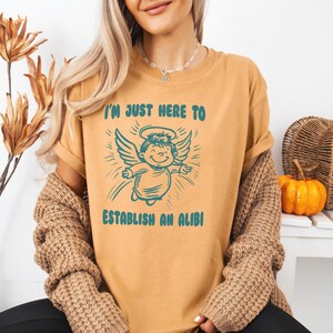 I'm Just Here to Establish an Alibi Funny T-shirt, Angel Humor Graphic ...