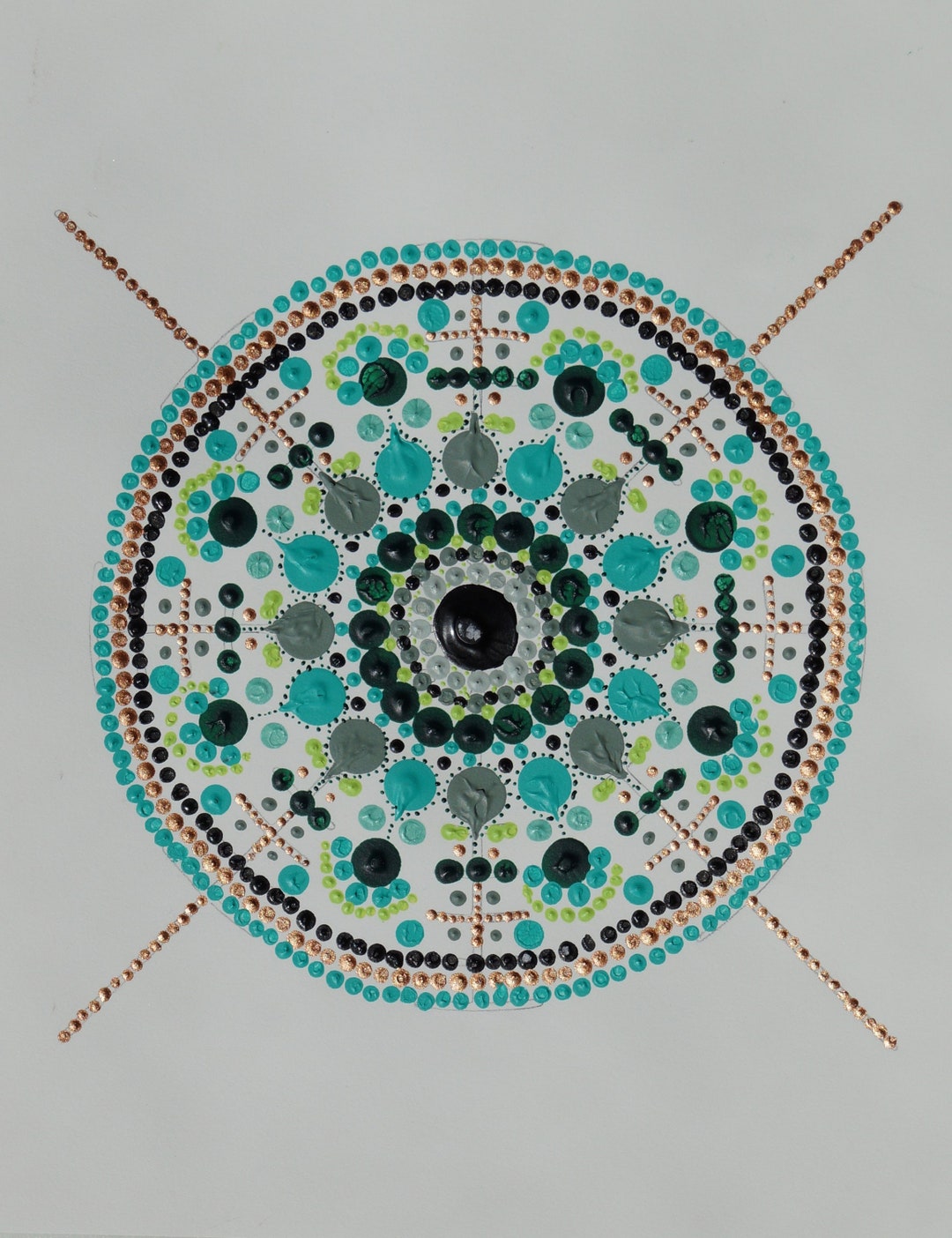 An Ornate Circular Pattern of Dots in Turquoise, Gold and Green Colors ...