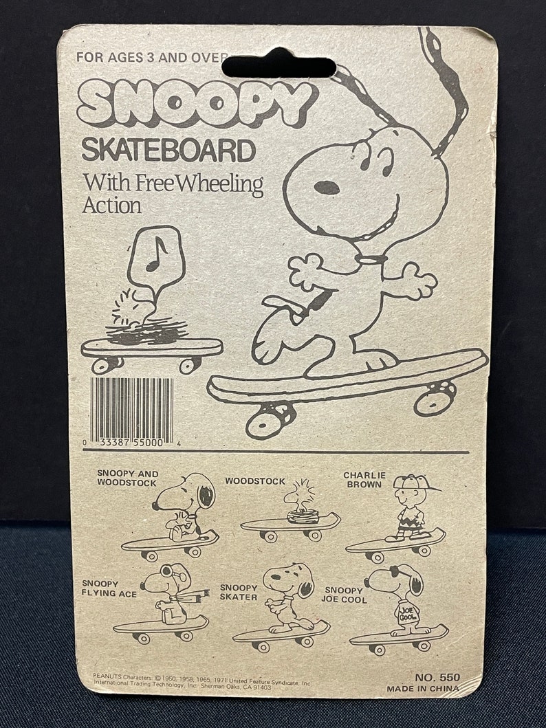 Vintage Retro Peanuts Snoopy Skateboard Free Wheeling Action Woodstock in Nest on Blue ...