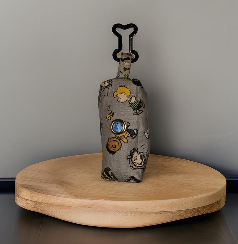 Peanuts Gang, Snoopy, Charlie Brown, Woodstock, Dog Waste Bag Holder ...