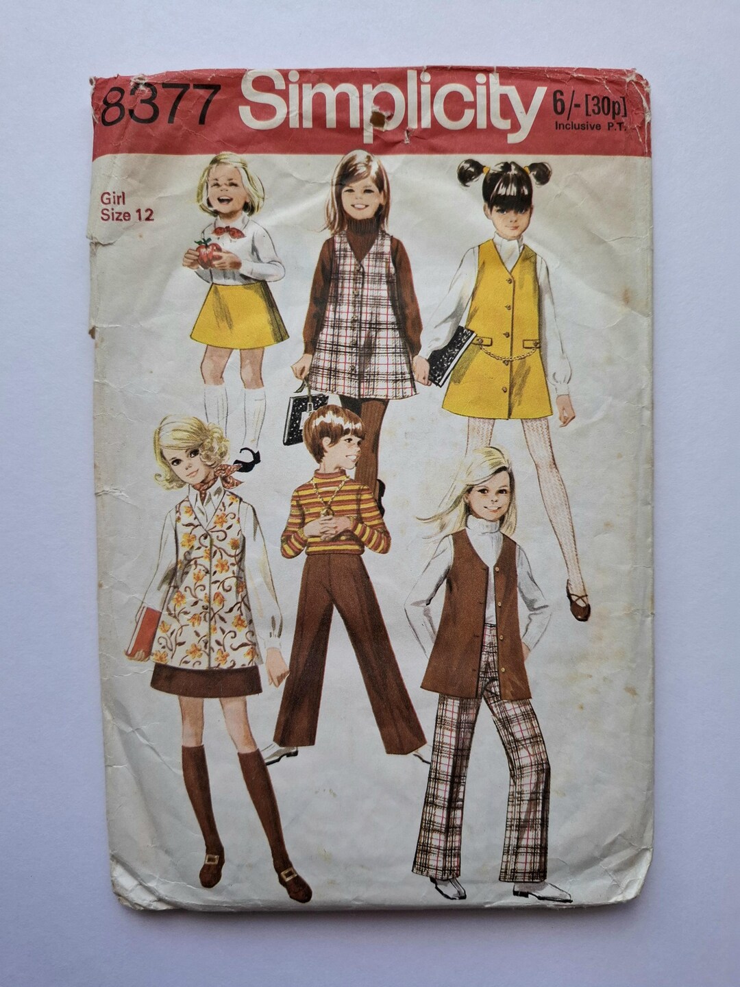 1960s Girls Buttoned Dress or Vest, Skirt and Pants Sewing Pattern ...
