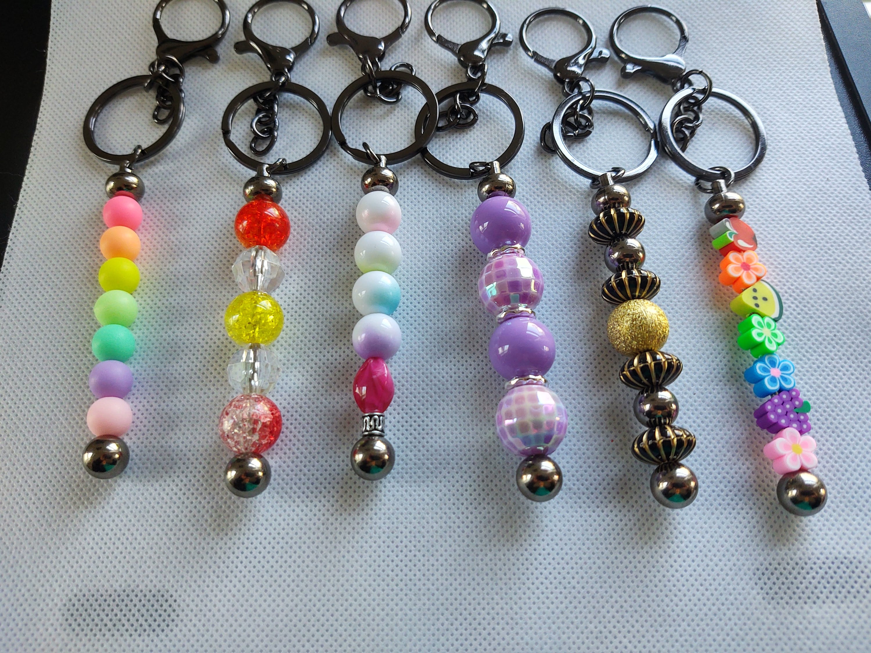 Stunning Beaded Keychains on a Black Post. Be the First Among Your ...