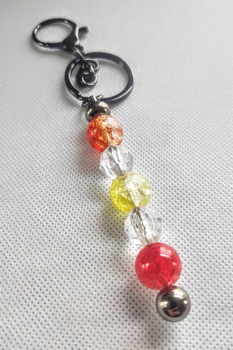 Stunning Beaded Keychains on a Black Post. Be the First Among Your ...