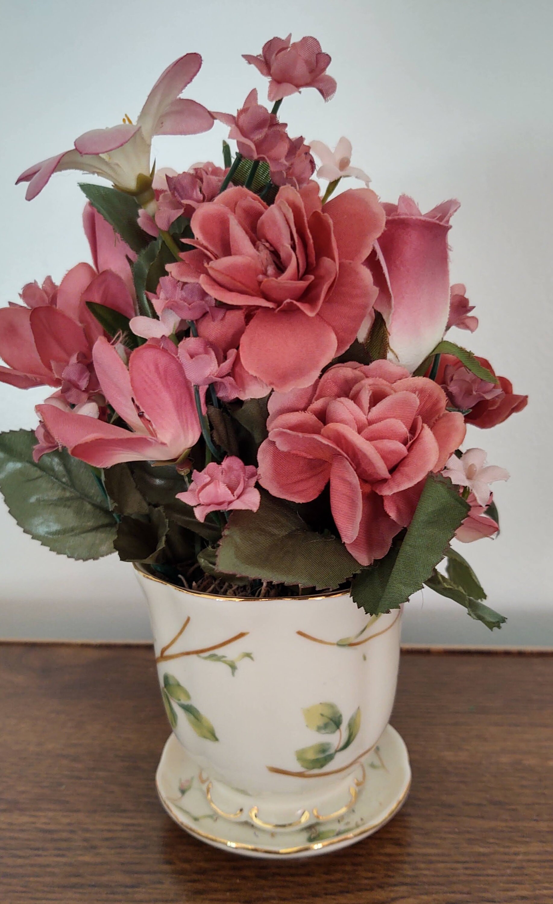 Silk Floral Roses in a Decorative Teacup. A Pink Floral Arrangement of ...