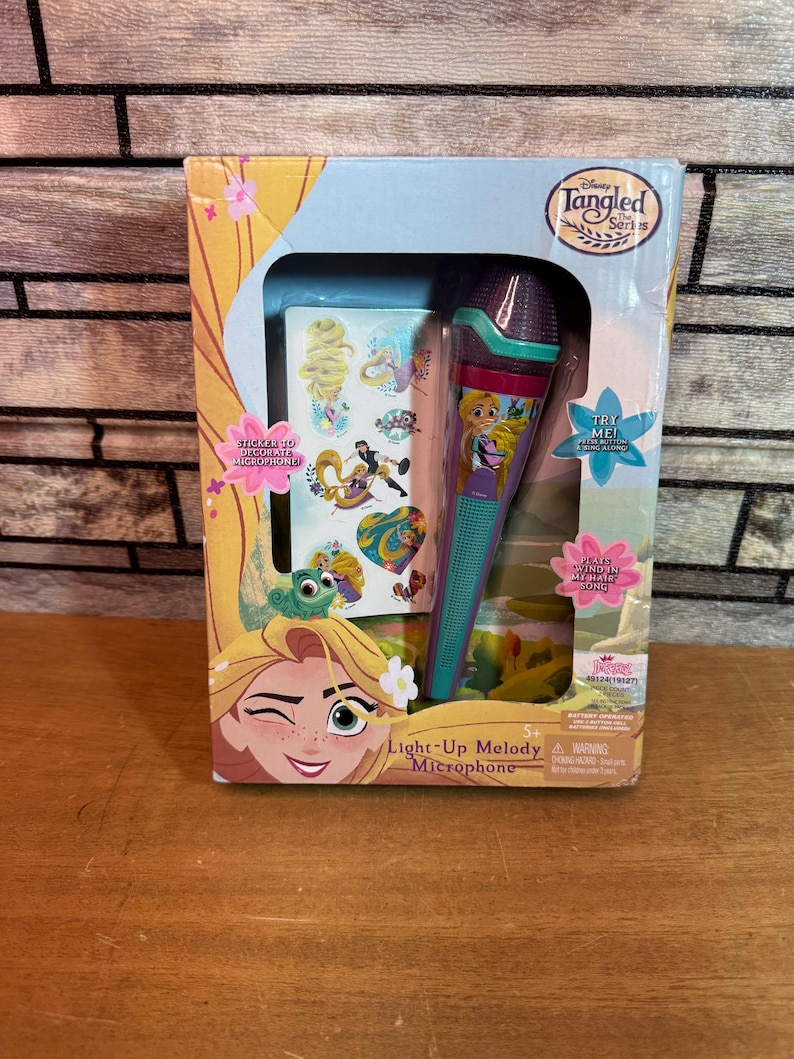 Disney Tangled Light up Melody Microphone, Stickers, We Ship Daily USPS ...