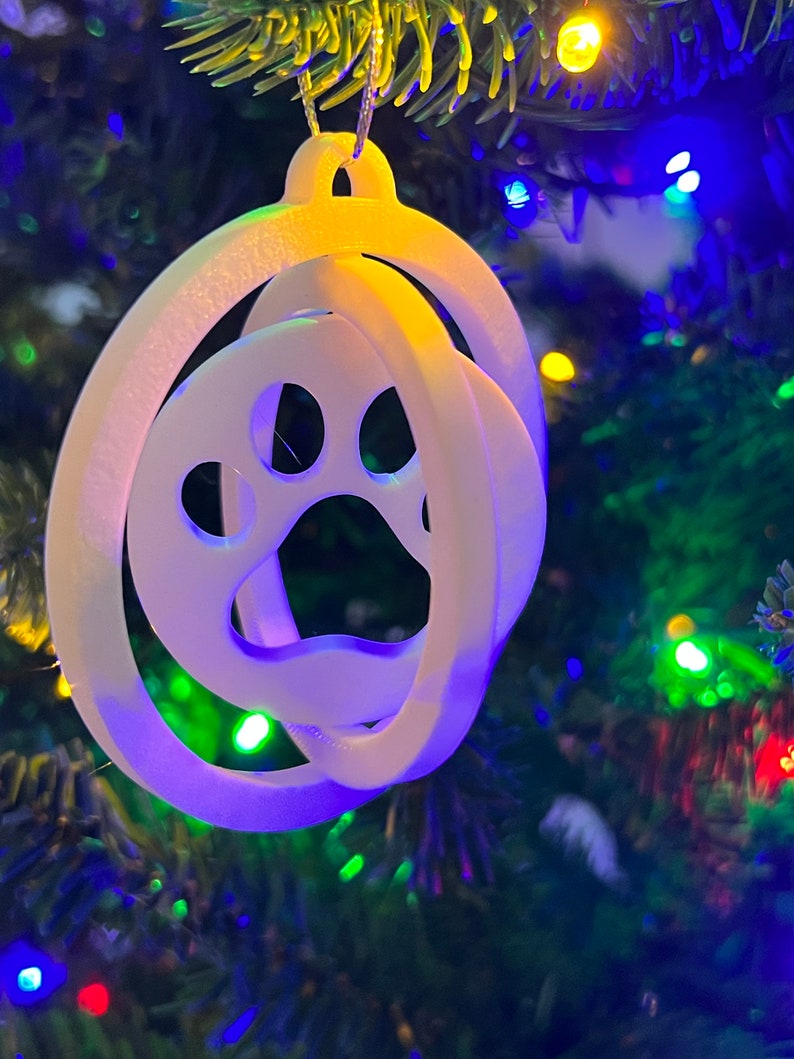 Spinning Paw Print Ornament - Etsy
