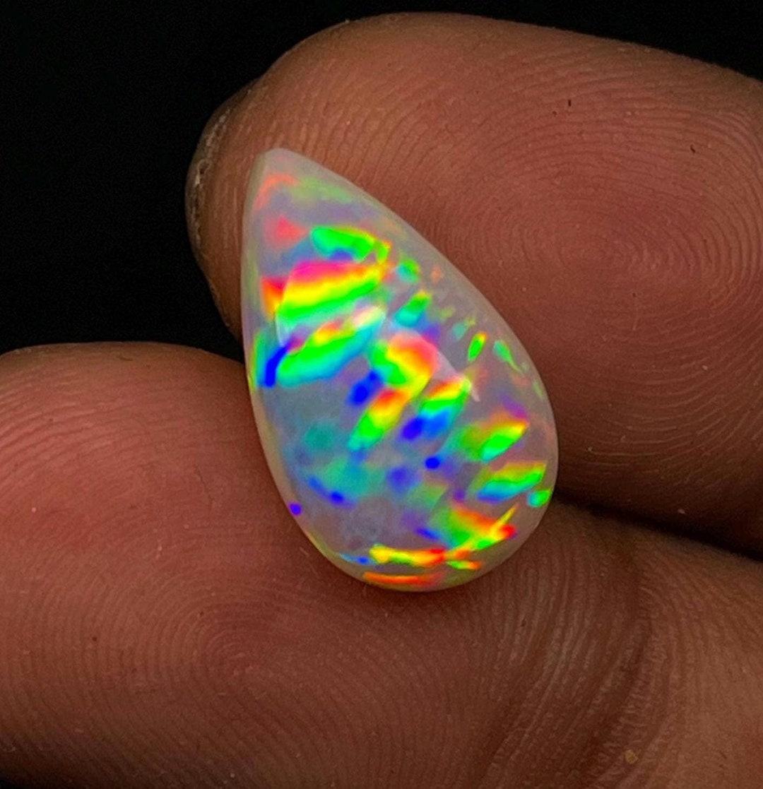 AAA+ Grade Natural White Ethiopian Opal Stone Rainbow Fire Opal Pear Loose Multi Fire Opal ...
