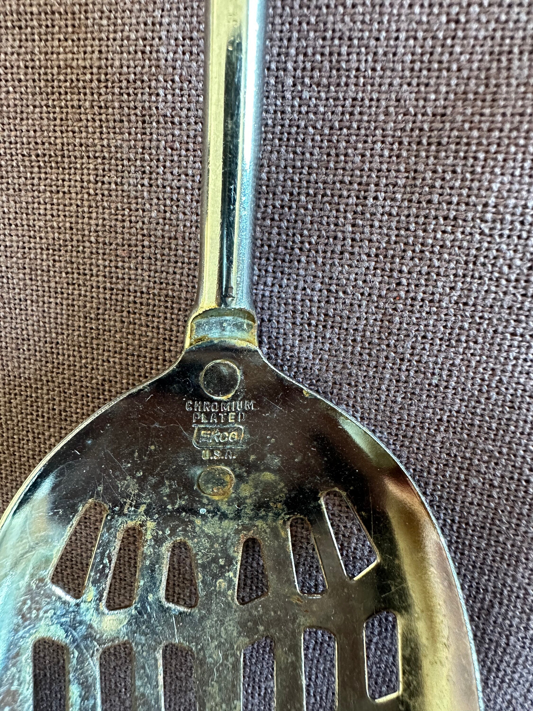 Ecko Slotted Spoon With White Handle - Etsy