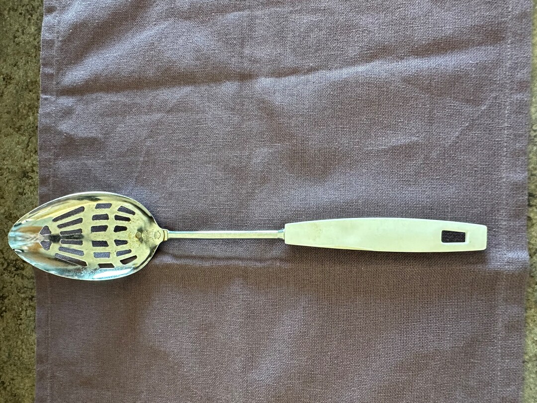 Ecko Slotted Spoon With White Handle - Etsy