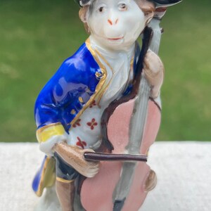 Antique Porcelain monkey Cellist or Cello Player. Gold Anchor Mark ...