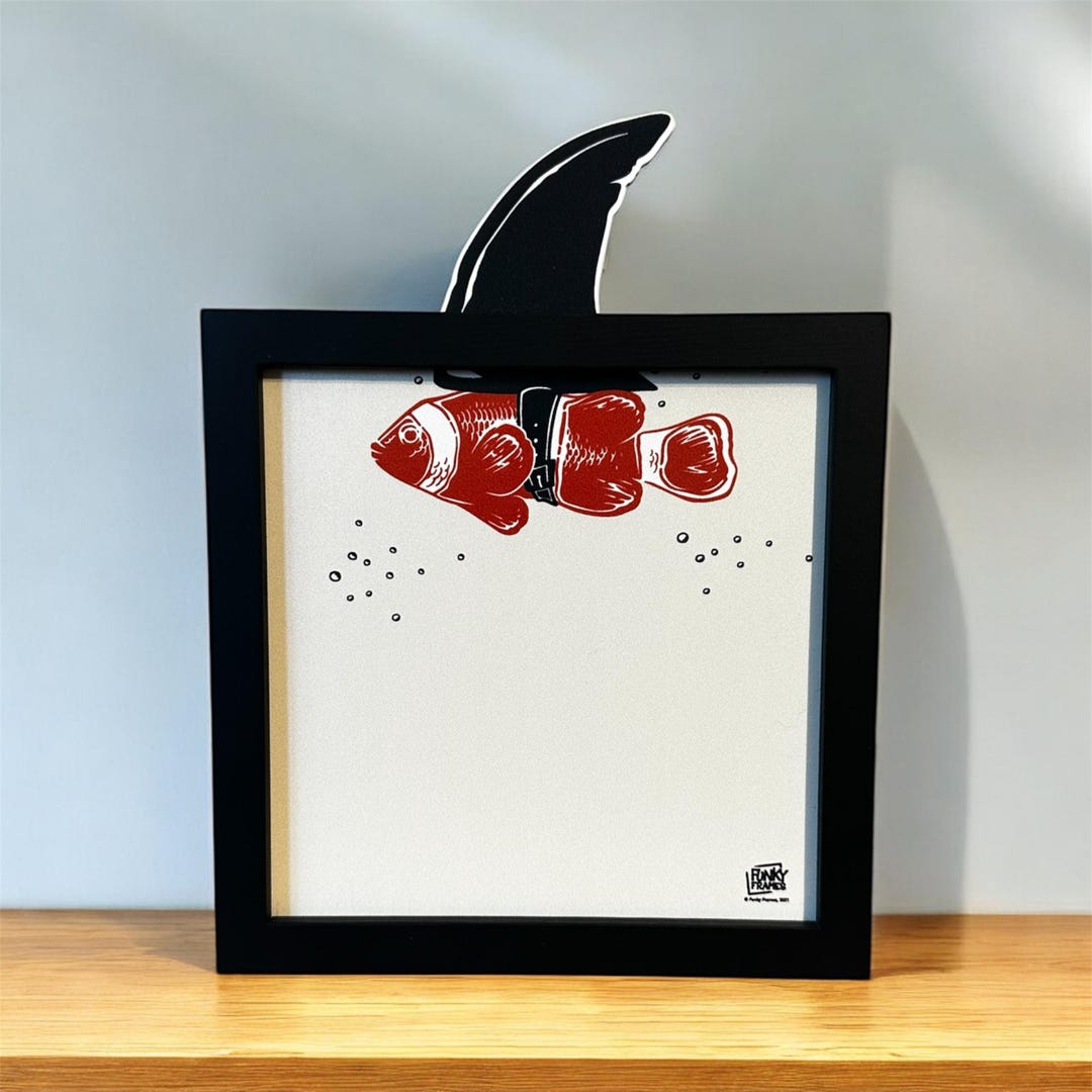 The Clownfish Fin Sticking Out of the Frame Invites Us to Think ...