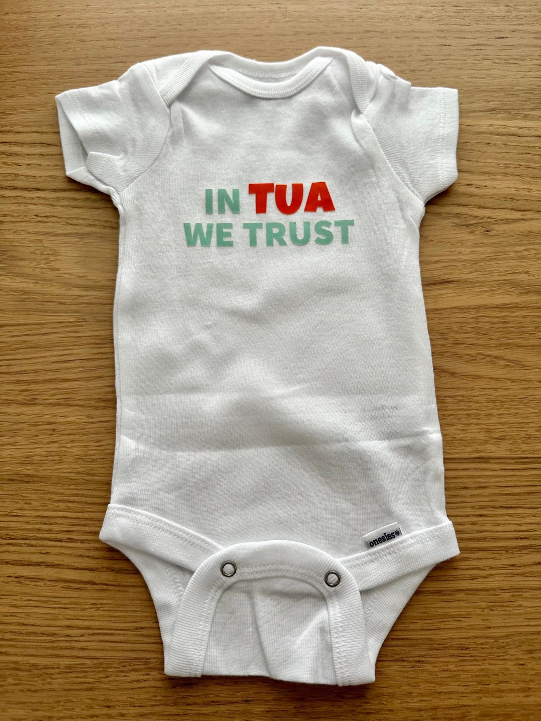 Miami Dolphins Football in TUA We Trust Baby Bodysuit - Etsy