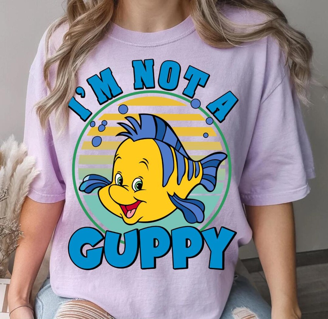 Disney the Little Mermaid Flounder I'm Not a Guppy Princess Ariel Shirt ...