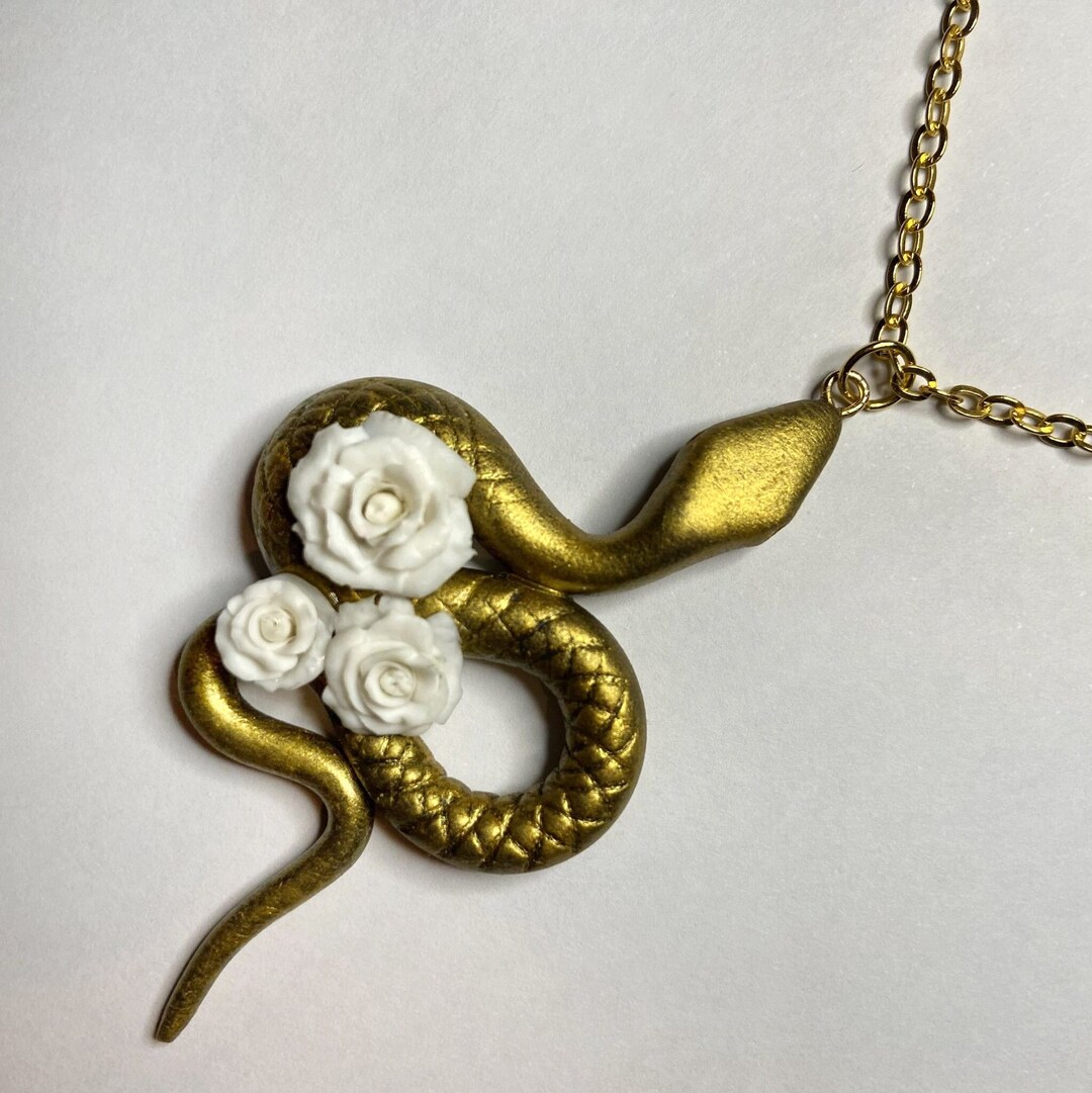 The Ballad of Songbirds & Snakes Necklace - Etsy