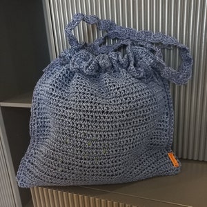 You Can Use the Navy Blue Postman Bag Model on One Shoulder If You Wish ...