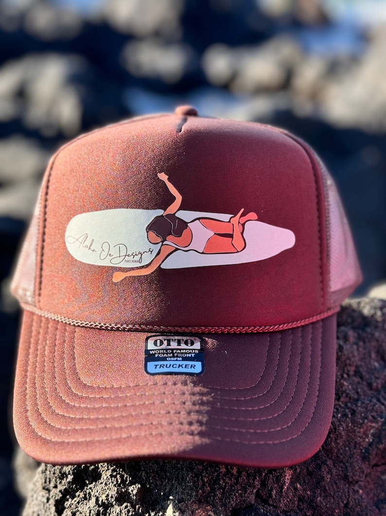 Wahine Surfer Paddling to the Lineup Aloha 'oe Designs Trucker Hat ...