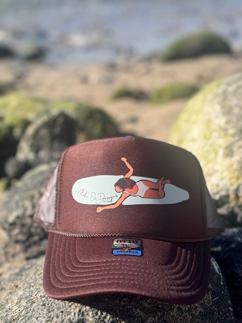 Wahine Surfer Paddling to the Lineup Aloha 'oe Designs Trucker Hat ...