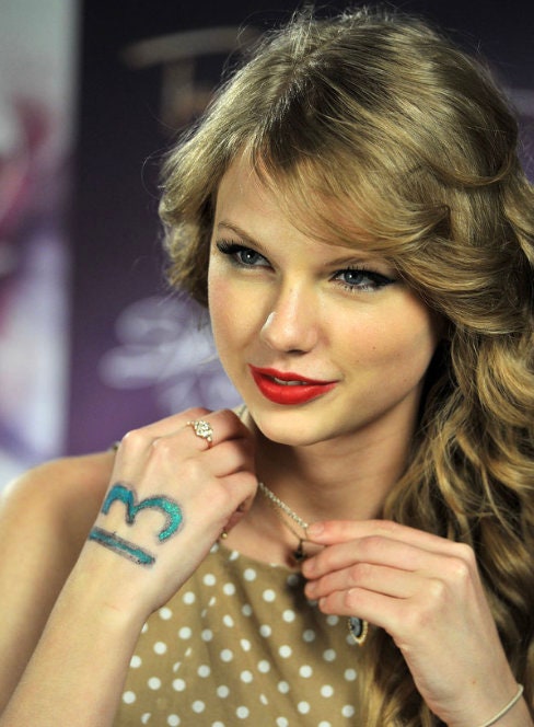 Taylor Swift-inspired Lucky Number 13 Paints on Her Hand Before ...