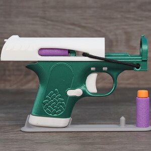 Minimint Nerf Blaster Mint Case - Holds Your Mints & Shoots REAL Nerf Darts. Fill Magazine With ...