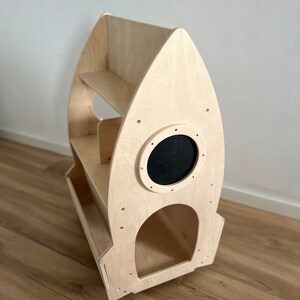 Rotating Rocketship Rack for Kids Books and Toys With Magnetic Drawing ...