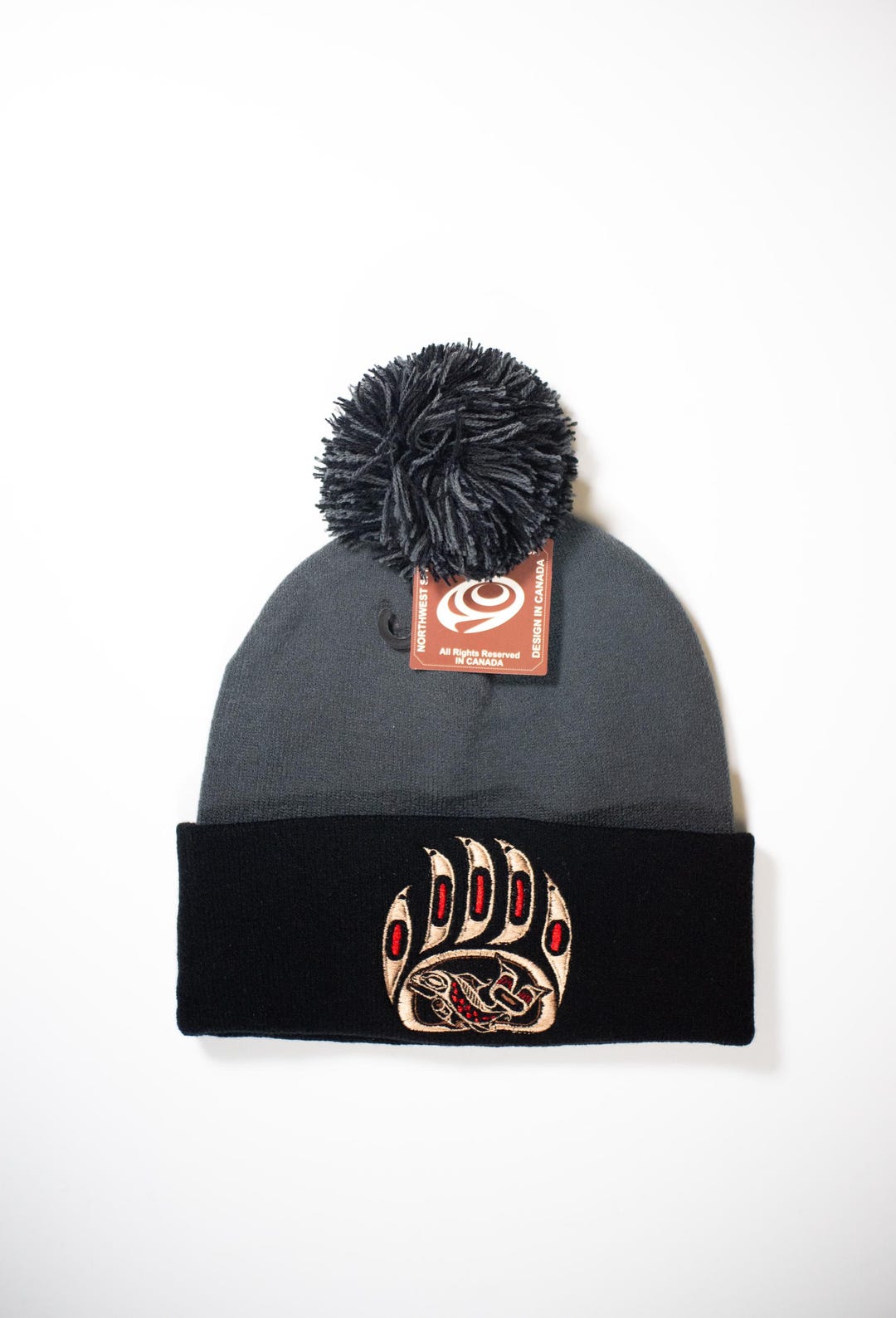 First Nations 'paw' by Gene Suyu Pom Pom Toque Beanie Hat | Embroidery ...
