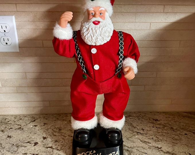 Rock and Roll Hip Swinging Santa. Sings Santa Clause is Coming to Town ...