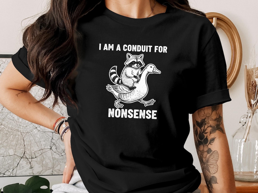 I Am A Conduit for Nonsense Shirt - Funny Raccoon Riding a Goose Shirt ...