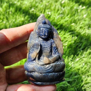 Blue Sapphire Buddha Statue - Embodiment of Spiritual Wisdom and Peace ...