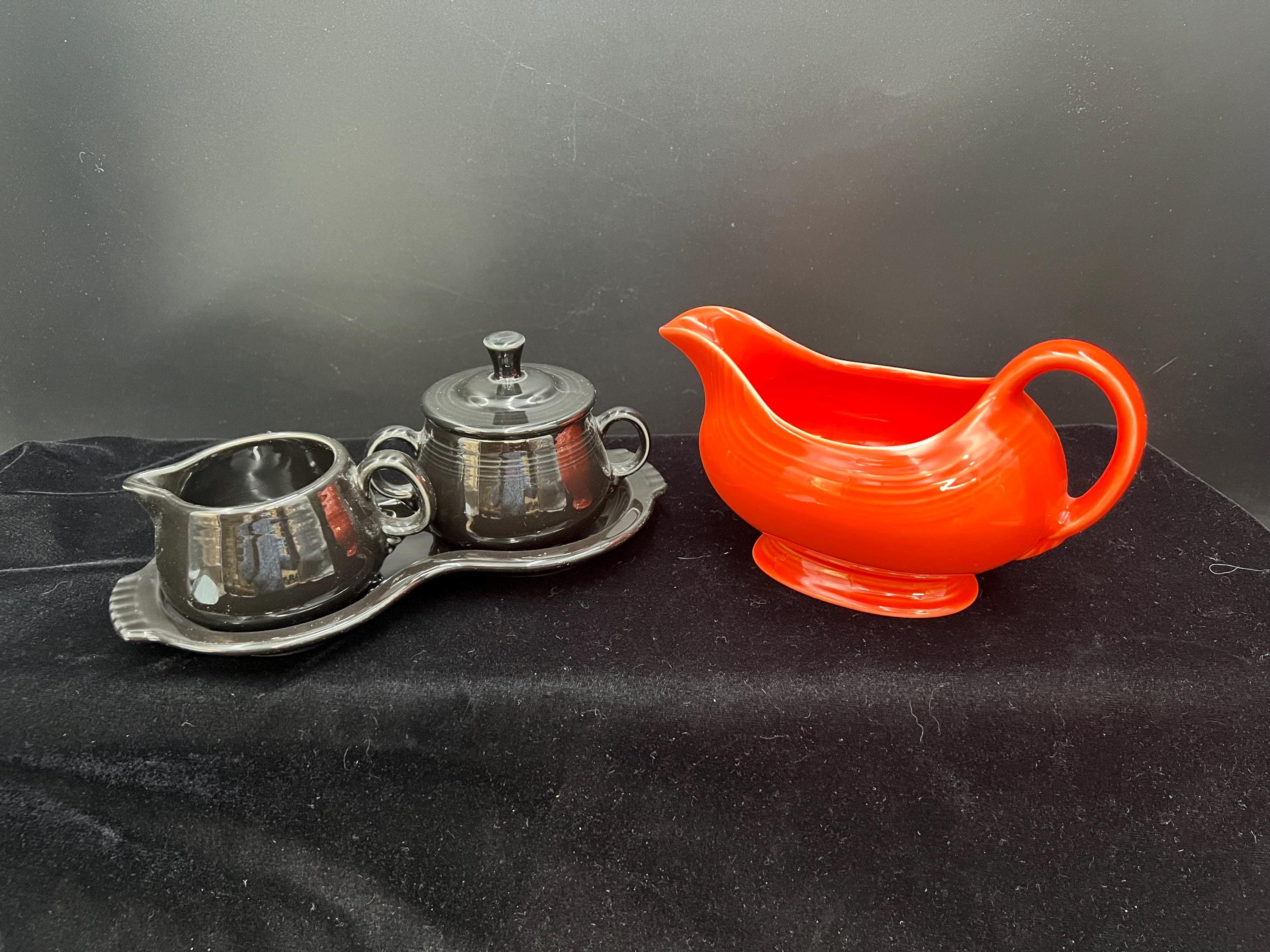 Fiesta Ware Creamer & Sugar on a Tray (black). Gravy Boat (poppy). Sold ...