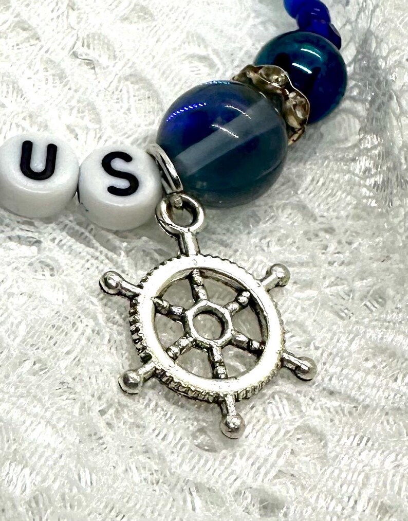 Odysseus Beaded Bracelet With Wheel Charm - Etsy