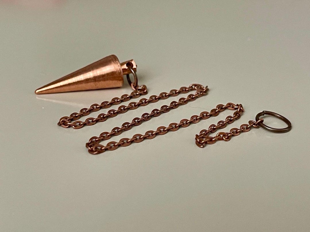 100% Pure Solid Copper Dowsing Pendulum on Bronze-colored Decorative ...