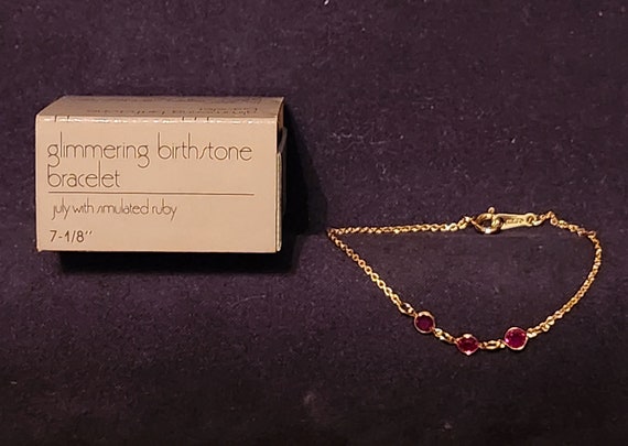 Avon birthstone bracelet store