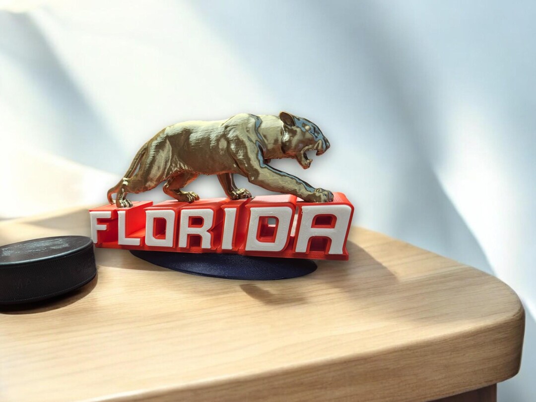 Sleek Florida Block Letters With Stalking Hunter Panther Hockey Statue ...