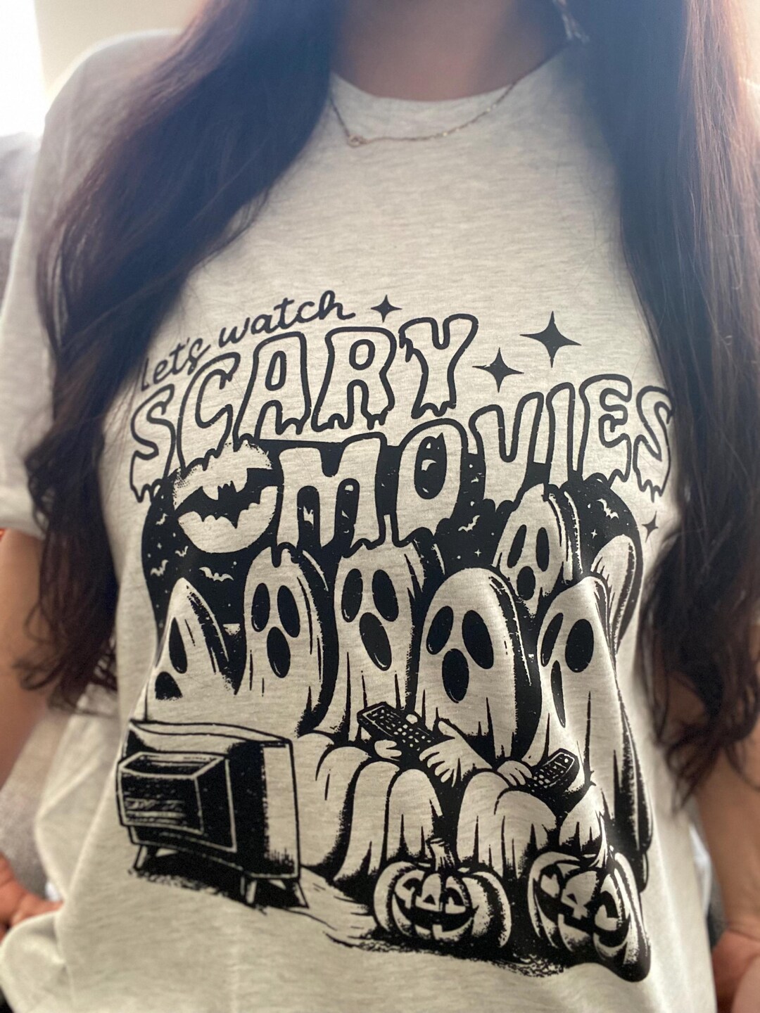 Let's Watch Scary Movies Spooky Season T Shirt. Affordable Mom T Shirt ...