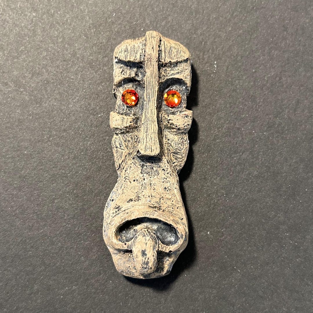 The Tongue Tiki Necklace in Washed Out Brown Over Black With Fiery ...