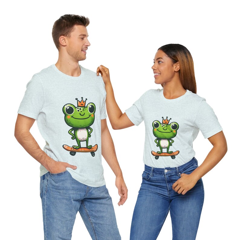 Unisex T-shirt With Cute Cartoon Frog Wearing a Crown on a Skateboard ...
