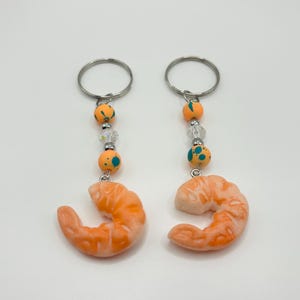 Shrimp Keychain Handmade With Orange Beads and Silver Colored Ring Over ...