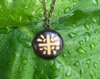 Mothra Symbol Pendant - Etsy