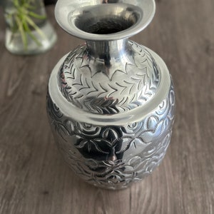 Handcrafted Silver Metal Vase With Floral Design, Featuring an Eastern ...