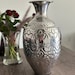 Handcrafted Silver Metal Vase With Floral Design, Featuring an Eastern ...
