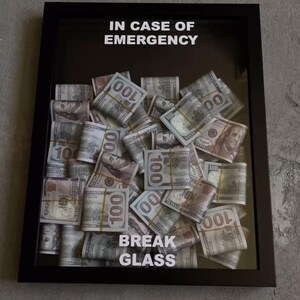 Emergency Box Special Gift. Dollars in a Black Wooden Frame. Money in a ...