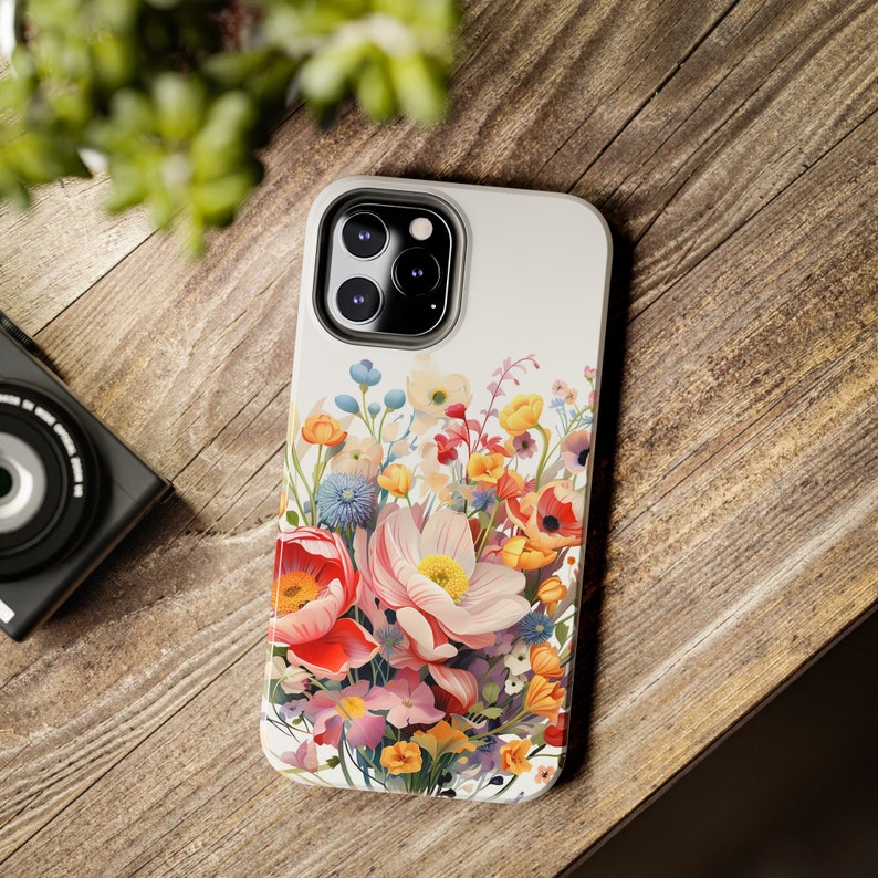 A Floral iPhone Case Adorned With a Floral Pattern Featuring Pink, Red ...