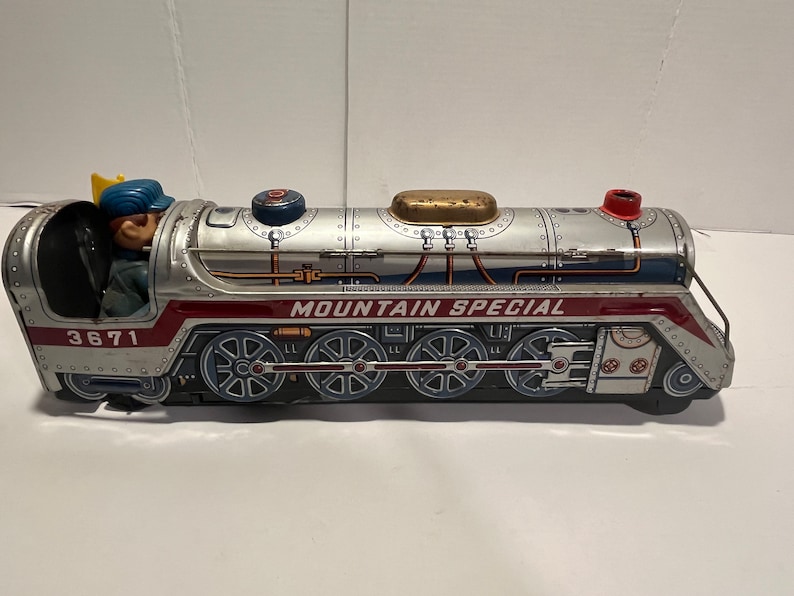 2 Battery Operated Trains Tin Litho Mountain Special and C7021 Made in ...