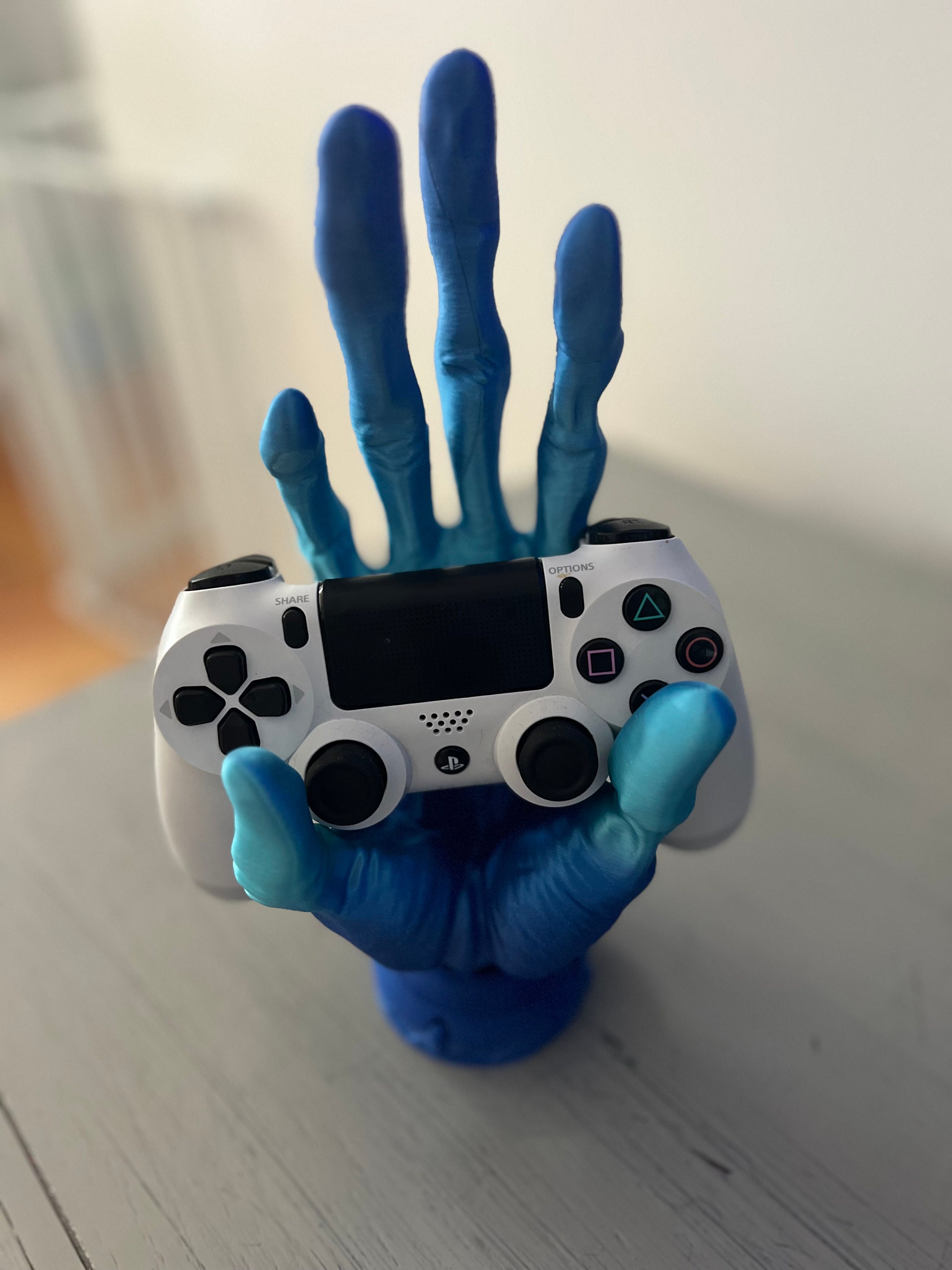 This 3D Game Control Holder is a 6 Finger Alien Hand to Hold Your ...